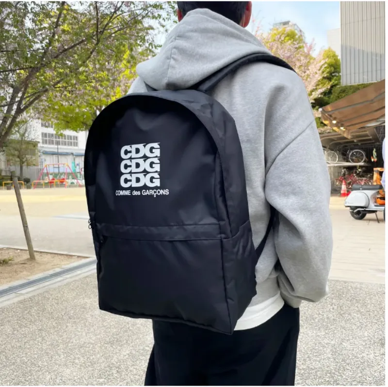CDG Men Backpack - POIZON